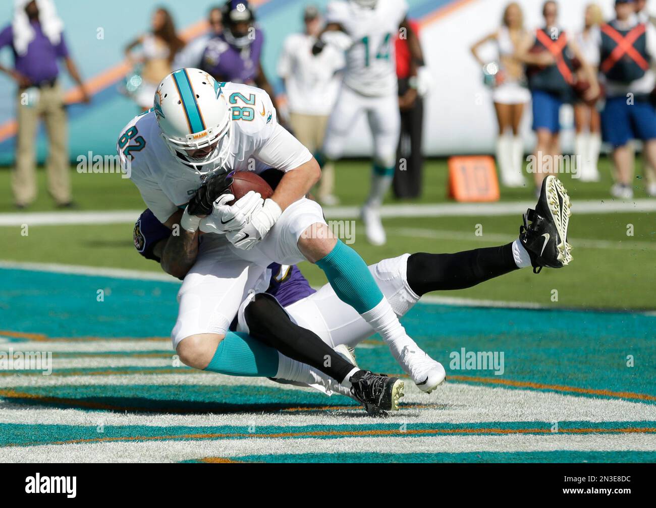 Miami Dolphins wide receiver Brian Hartline (82) scores a touchdown as ...