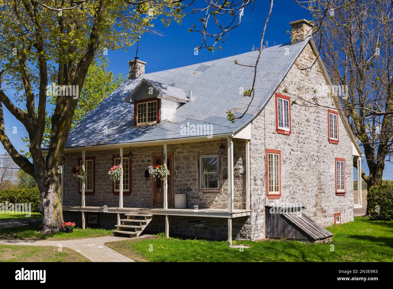 Old 1835 fieldstone house exterior in spring hi-res stock photography ...