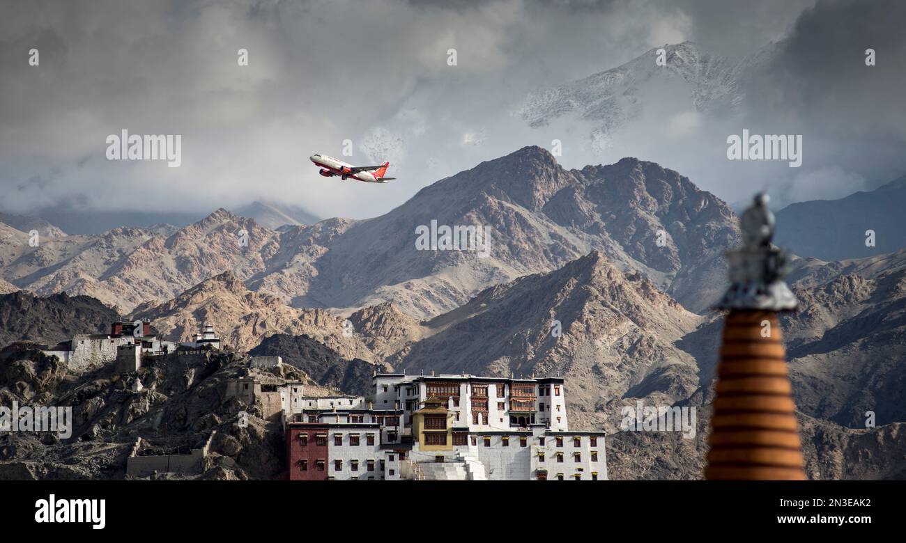 Airplane in flight over the Tibetan Buddhist, Spituk Monastery and the ...