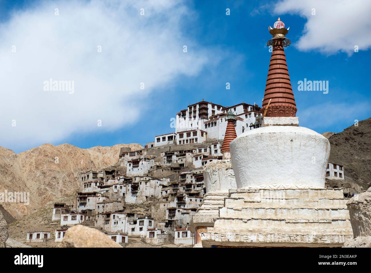 Close-up of Stupas with mountainside building complex of the Tibetan ...