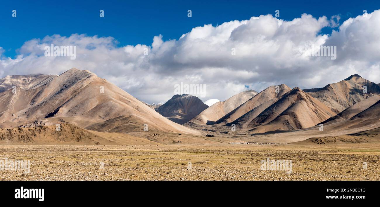 View of the Tibetan plateau with mountain peaks in the background ...