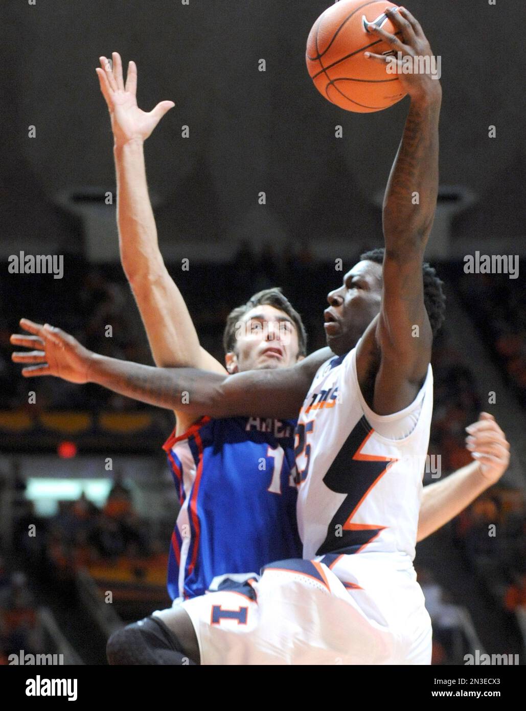 Illinois guard Kendrick Nunn (25) is guarded by American guard Jesse ...