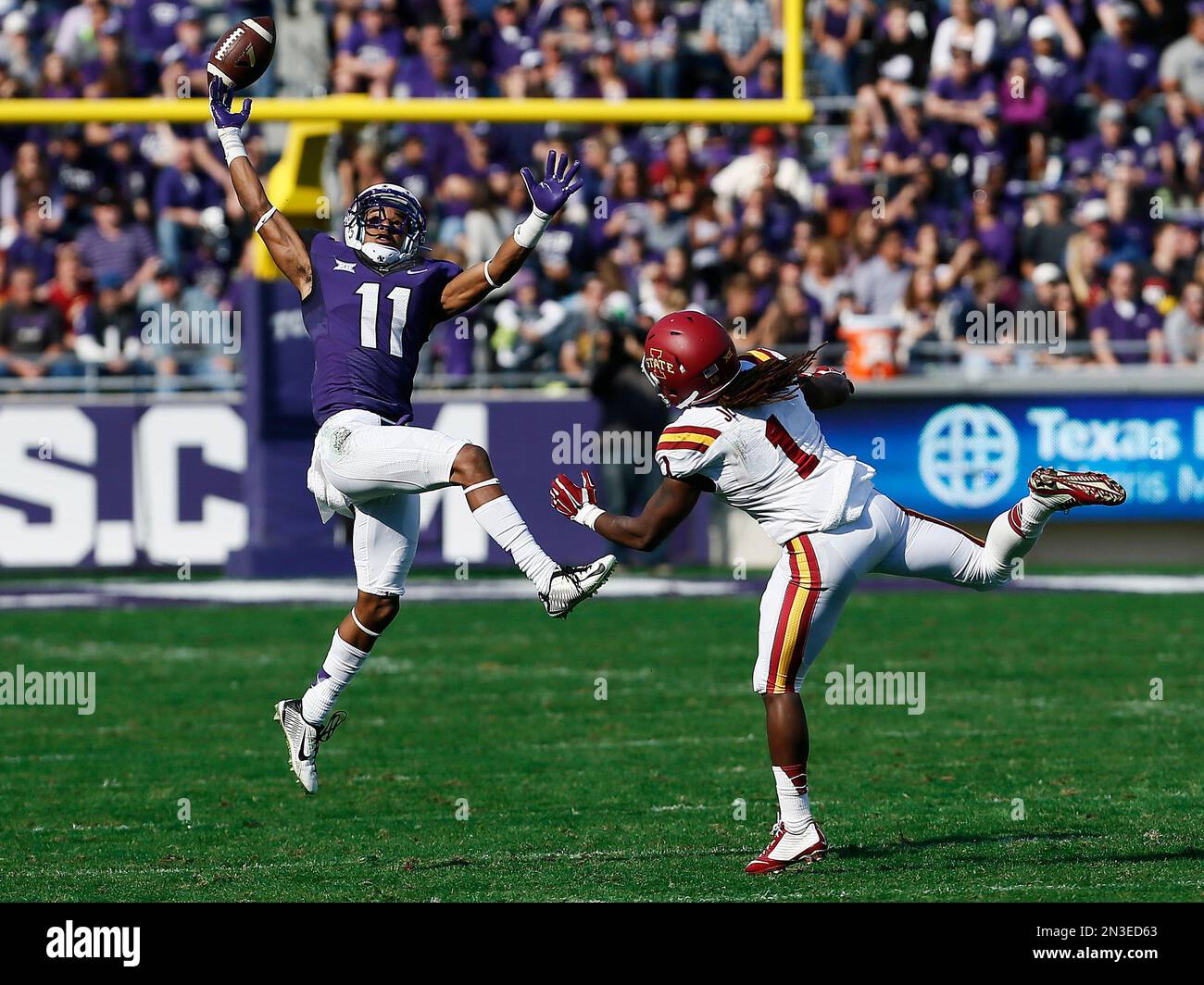 TCU cornerback Ranthony Texada (11) nearly intercepts a pass intended ...