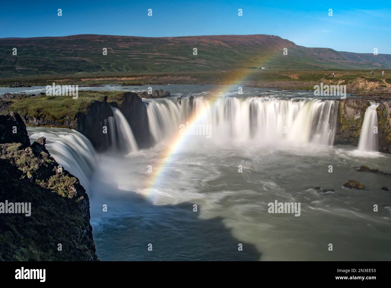 Stunning view of Goðafoss Waterfall with a rainbow. Godafoss is a ...