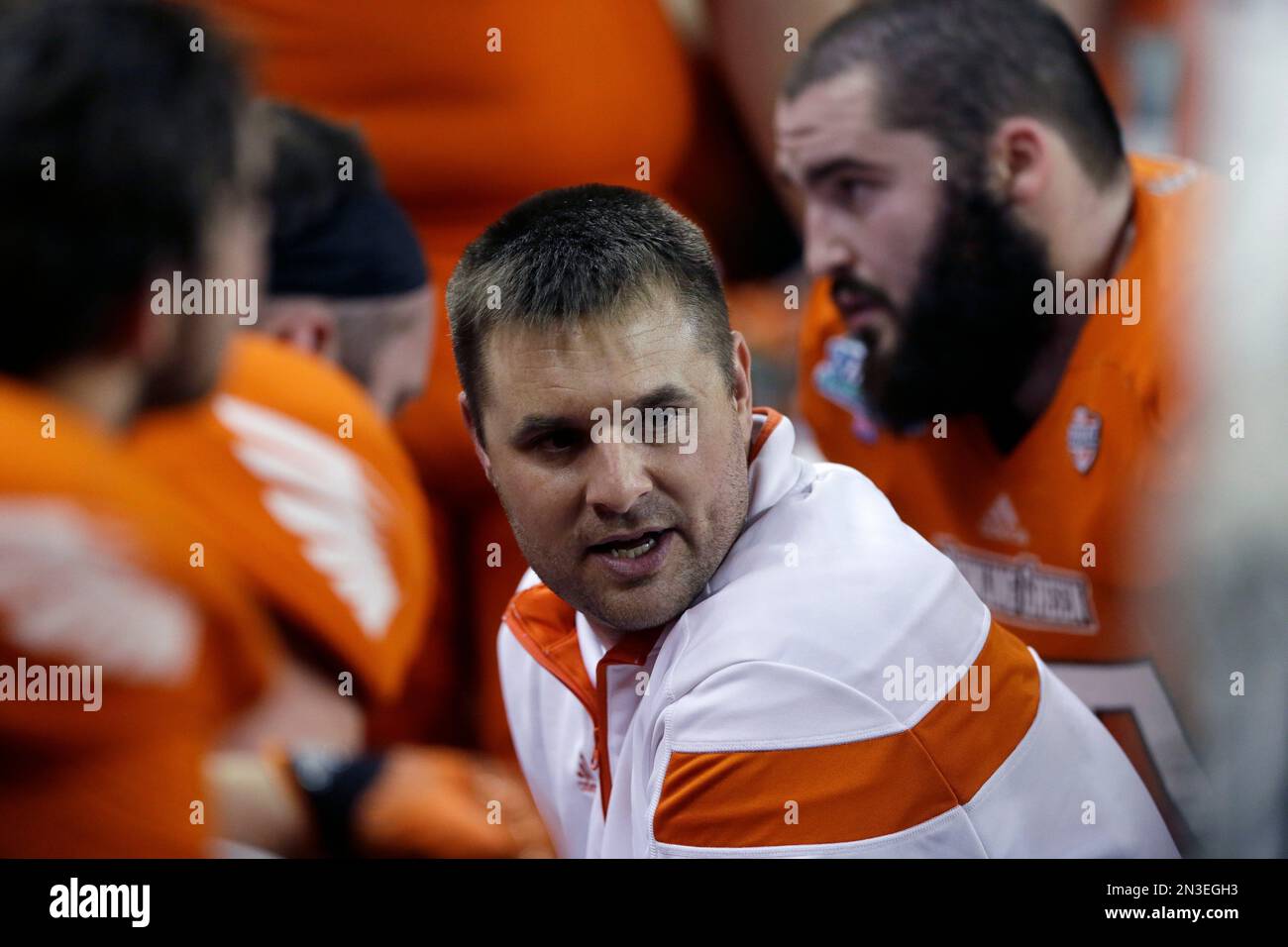 Bowling Green Co-Offensive Coordinator Matt Mattox talks to the team ...