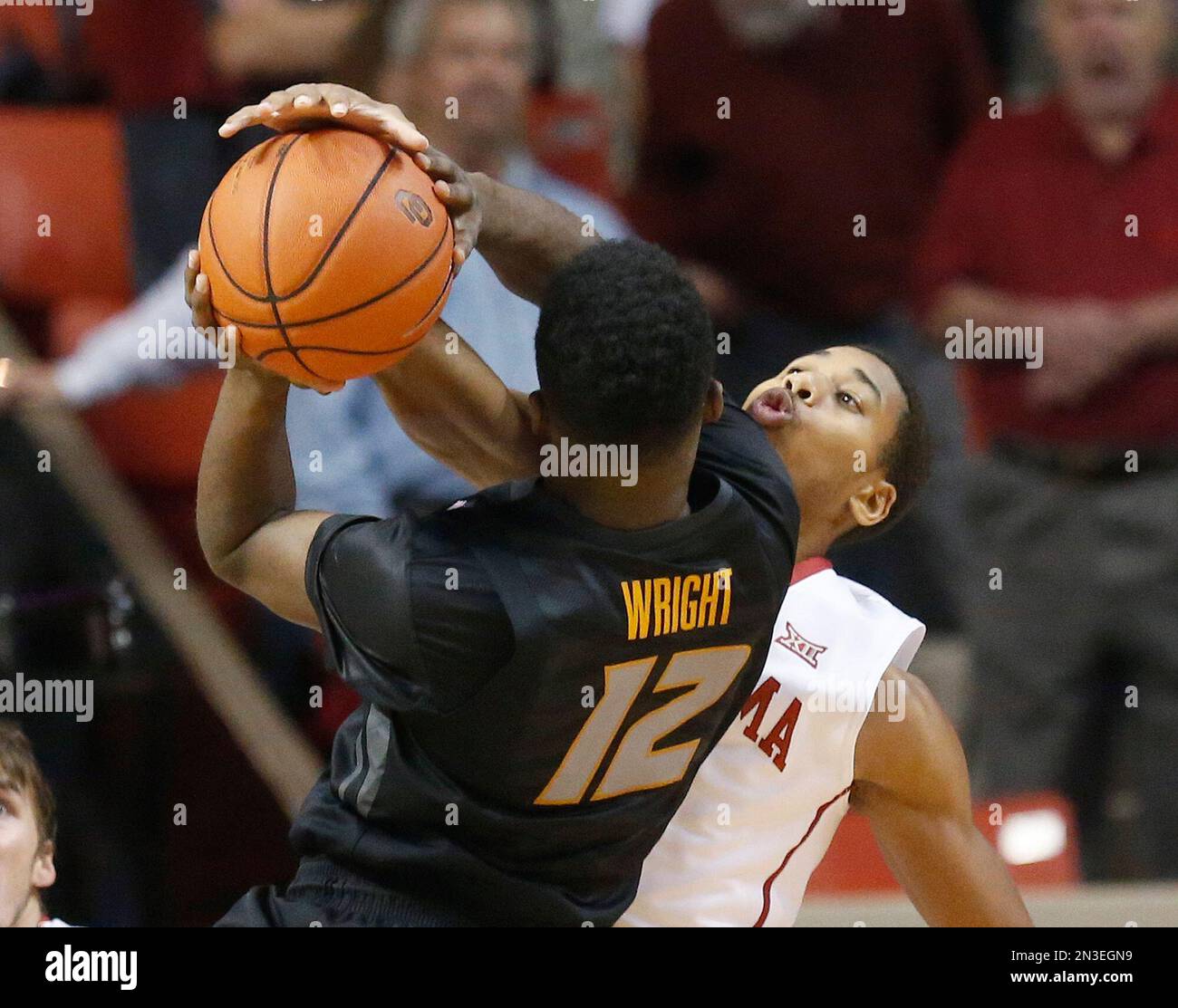Oklahoma guard Isaiah Cousins, right, gets his hand on the ball as ...