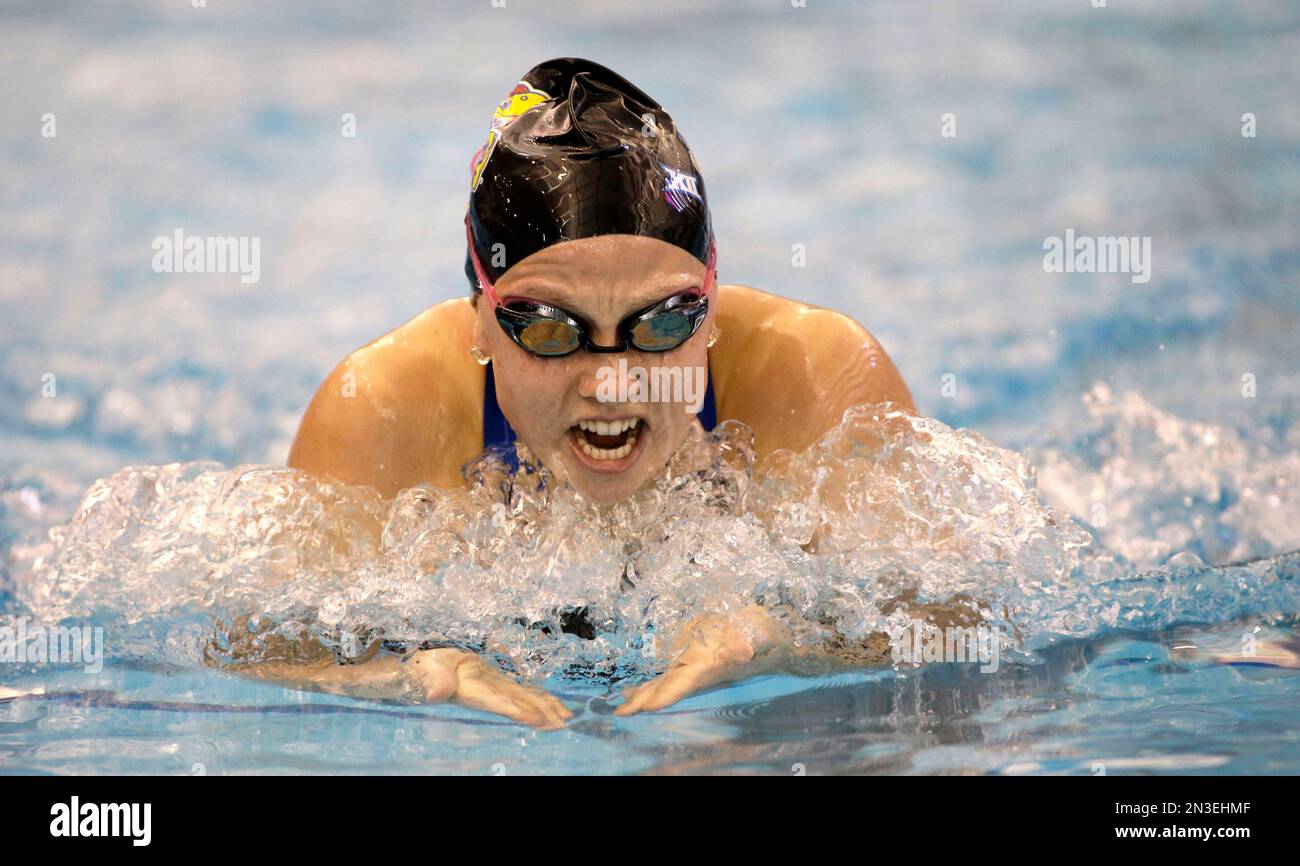 Chelsie Miller takes a breath during the breaststroke leg of her second ...