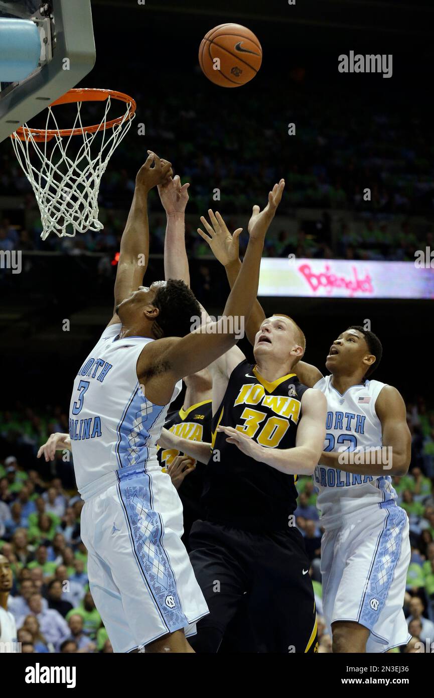 North Carolina's Kennedy Meeks (3) and Isaiah Hicks (22) reach for a ...