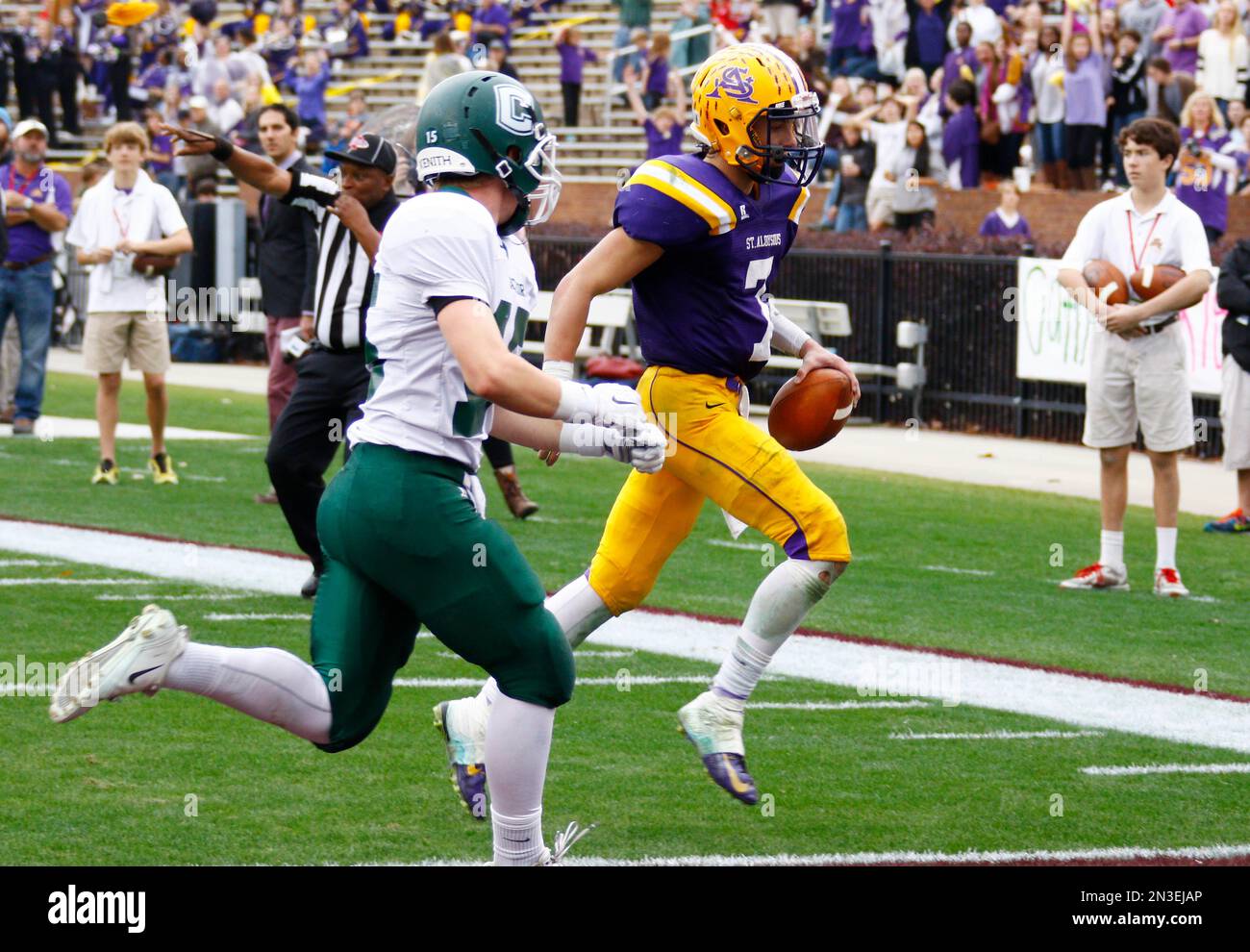 St. Aloysius quarterback Connor Smith runs past Cathedral free safety ...