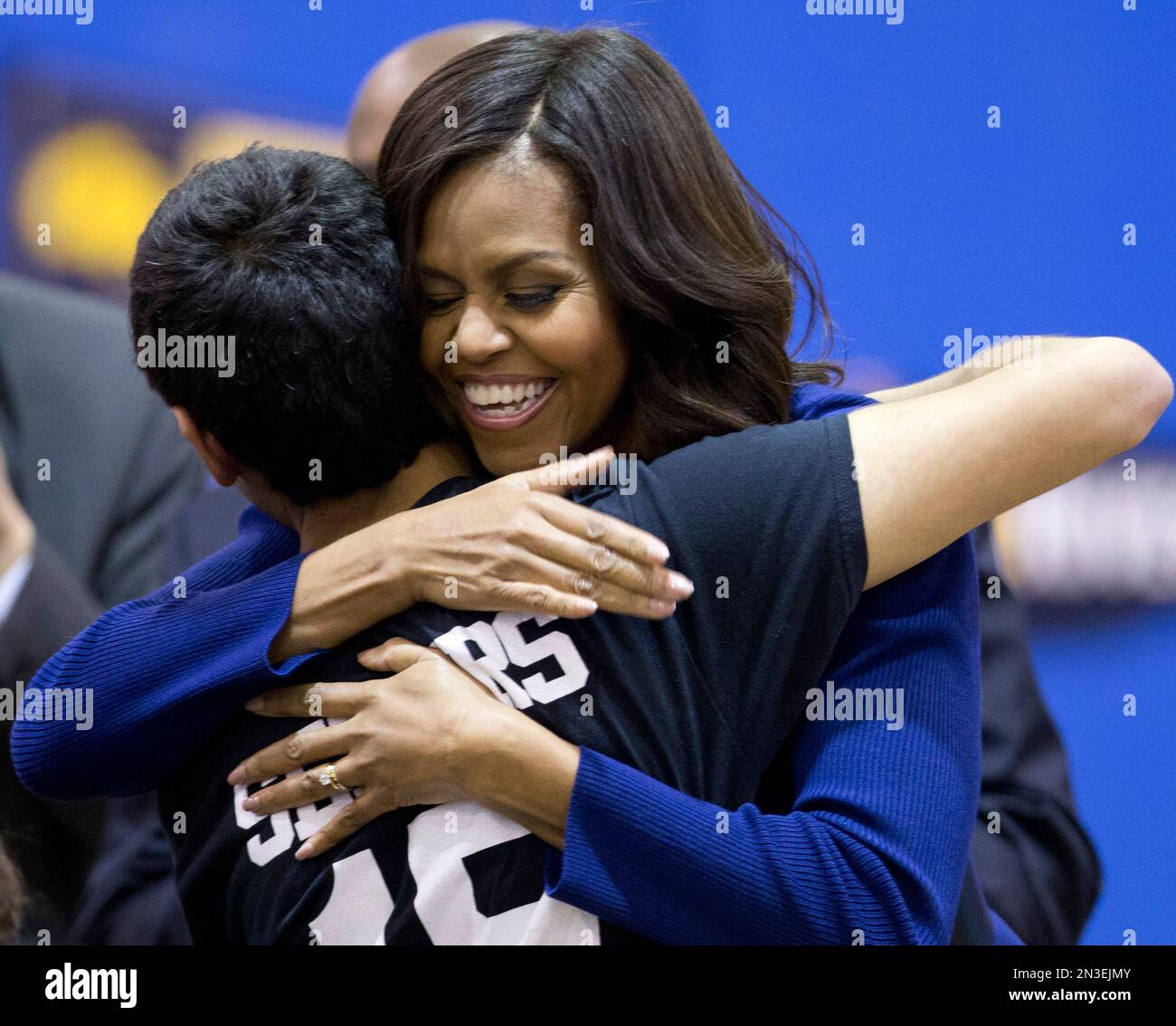 First lady Michelle Obama hugs a Capital City Public Charter School ...