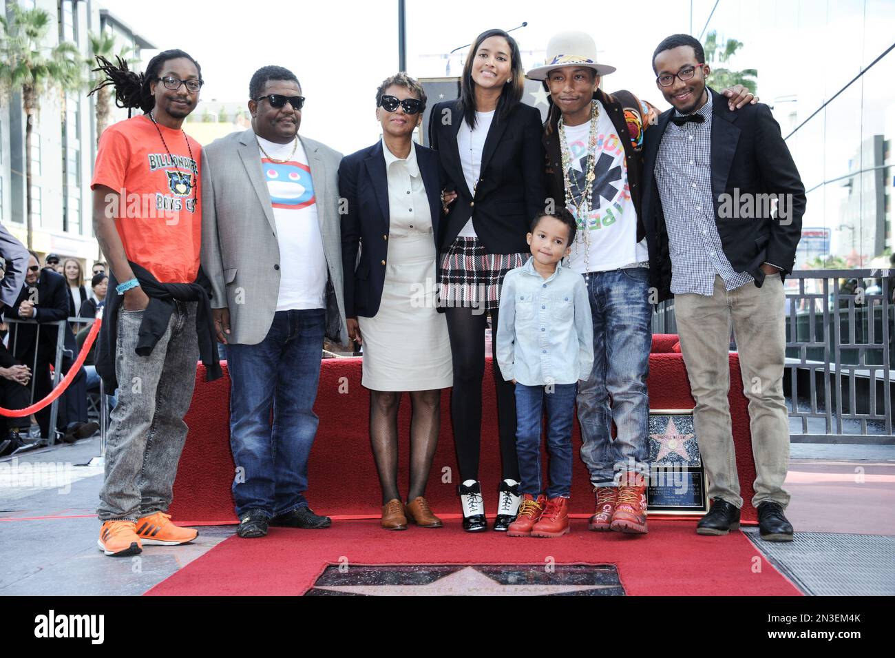 Pharrell Williams and family attend the ceremony honoring him with a ...