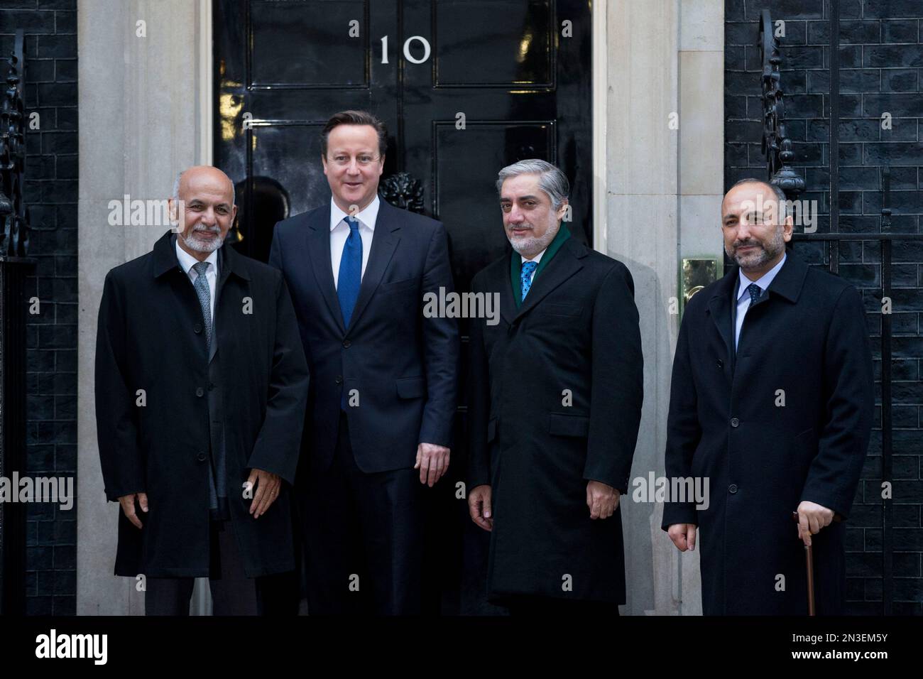 British Prime Minister David Cameron, second left, poses for ...