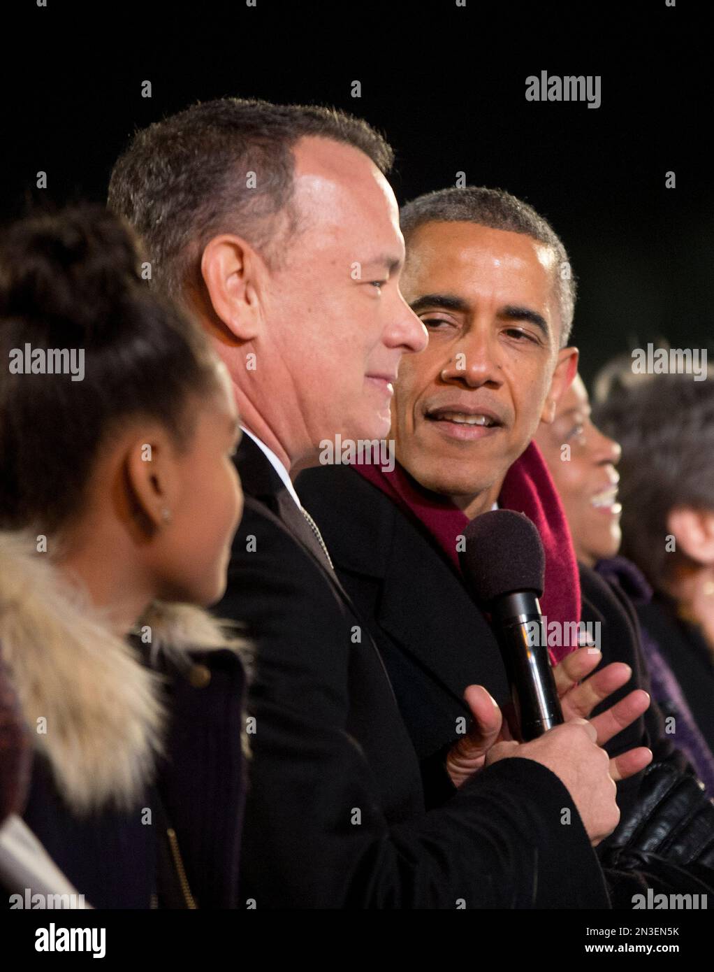 President Barack Obama, right, and actor Tom Hanks, left, talk as they ...