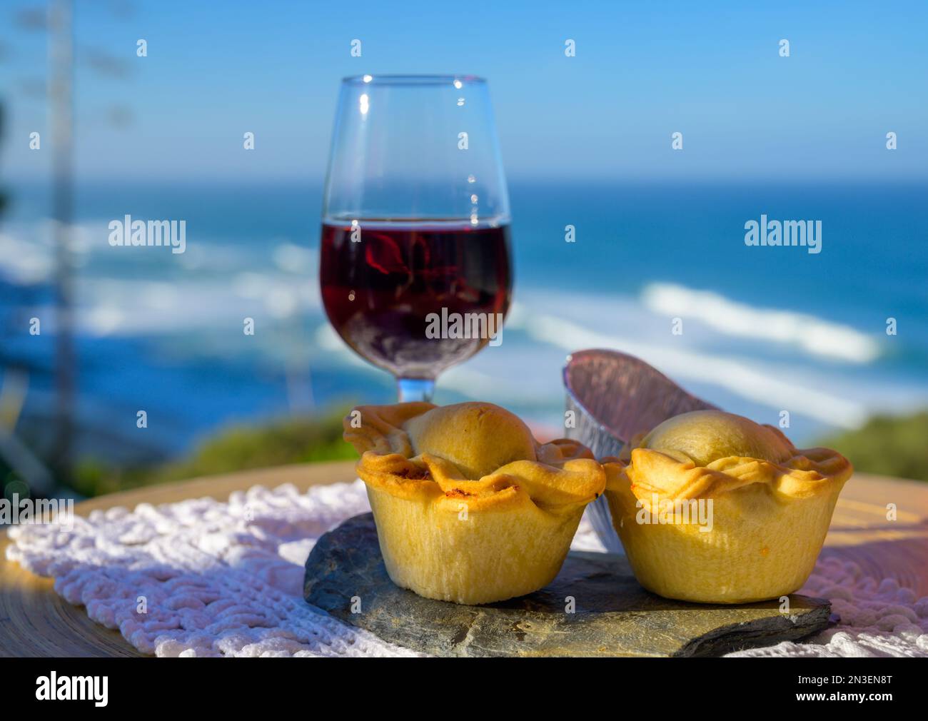 Pairing of Portugeese food and drink, glass of tawny porto wine and ...