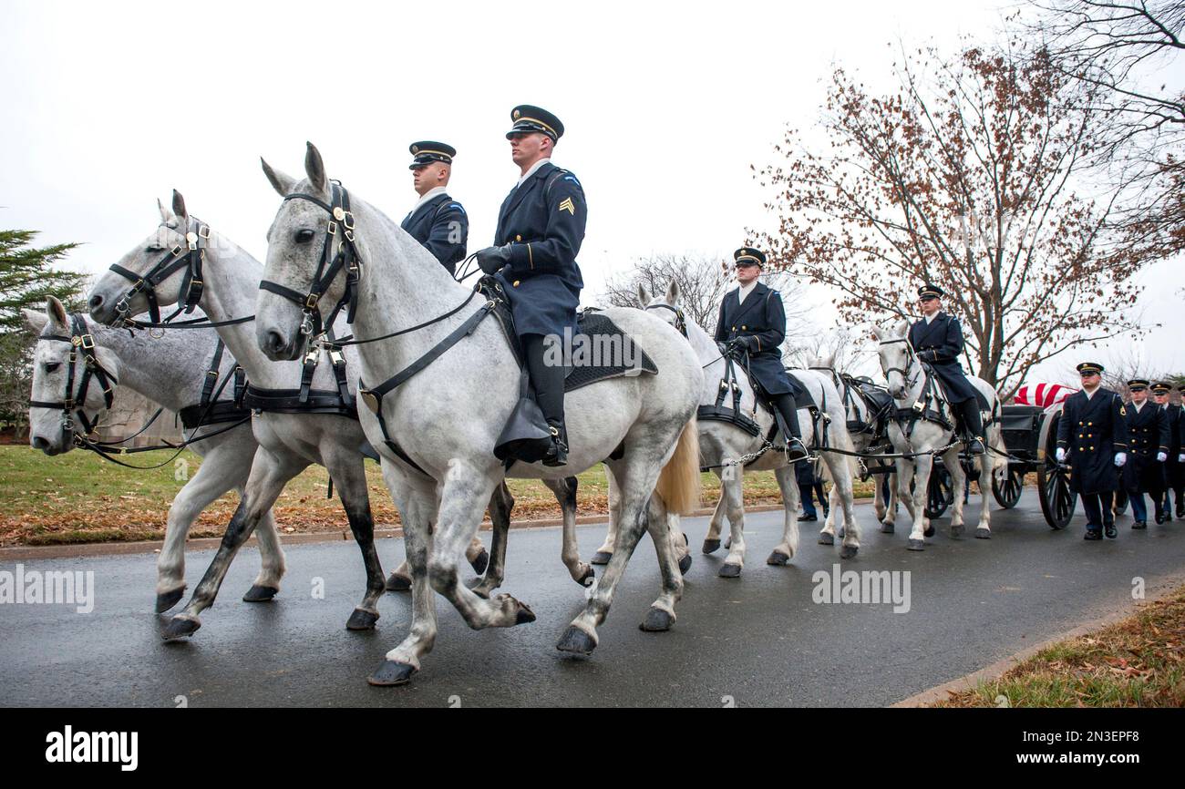 A caisson carries the remains of U.S. Army Air Forces Sgt. Charles A ...
