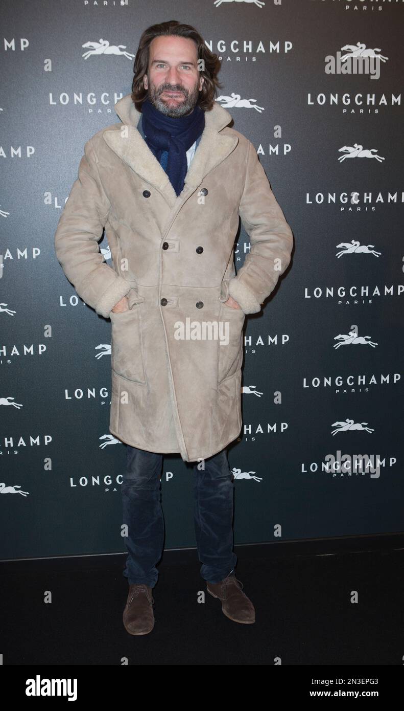 French novelist Frederic Beigbeder poses at the opening of the ...