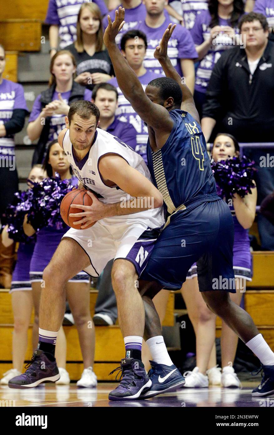 Northwestern center Alex Olah, left, drives against Georgia Tech center ...