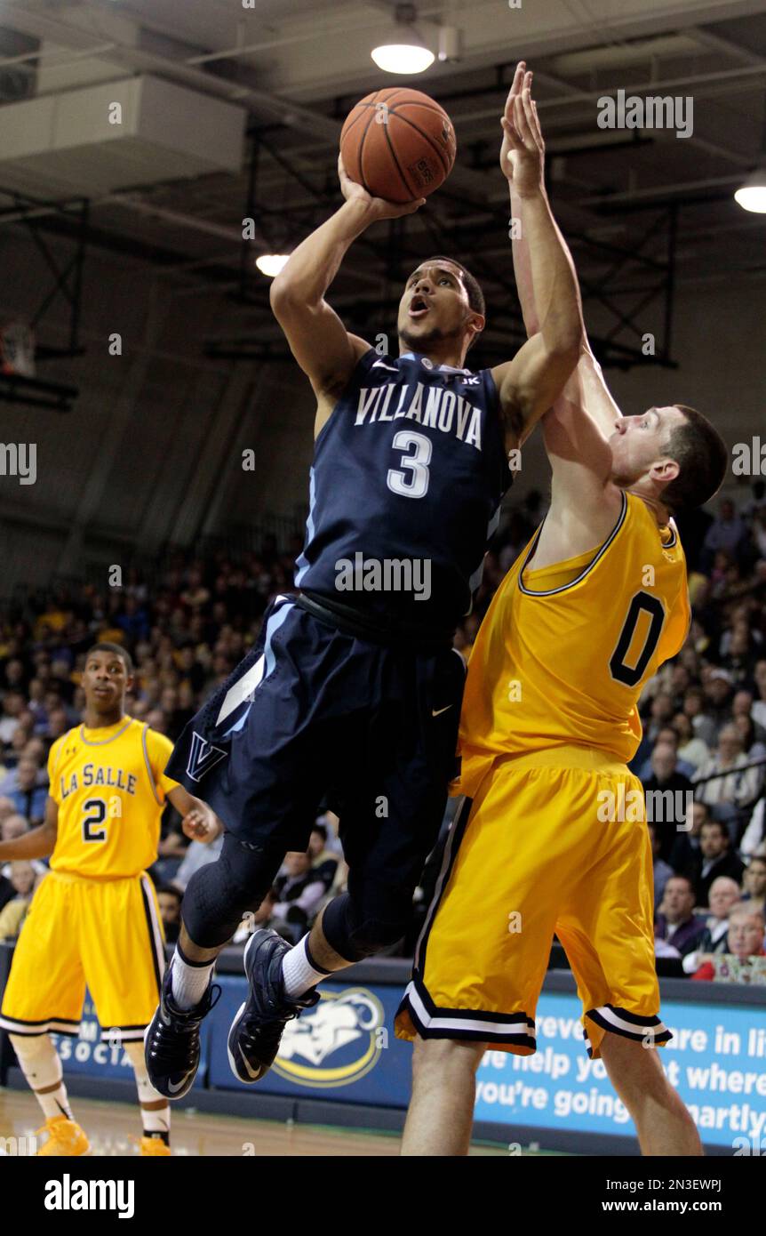 Villanova's Josh Hart (3)shoots as La Salle's Steve Zack (0) defends in ...