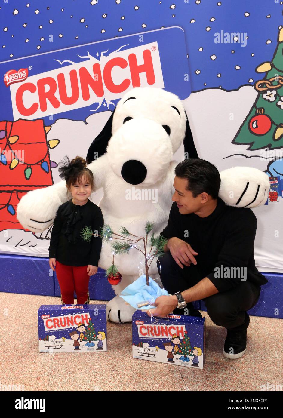 Mario Lopez and family celebrate with Snoopy for the launch of the new ...