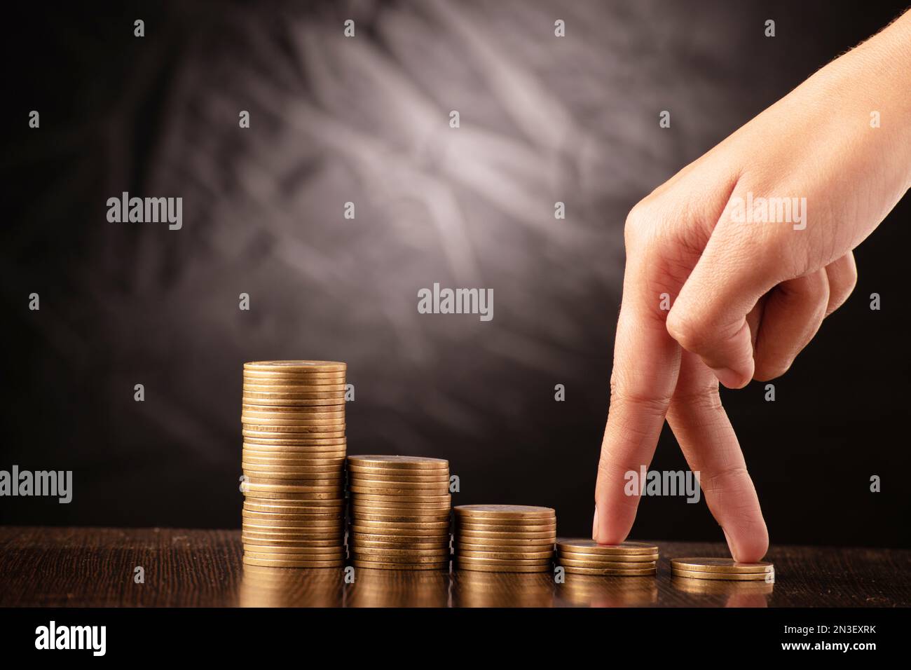 Finger walking up on stack of coin, making profit concept Stock Photo ...