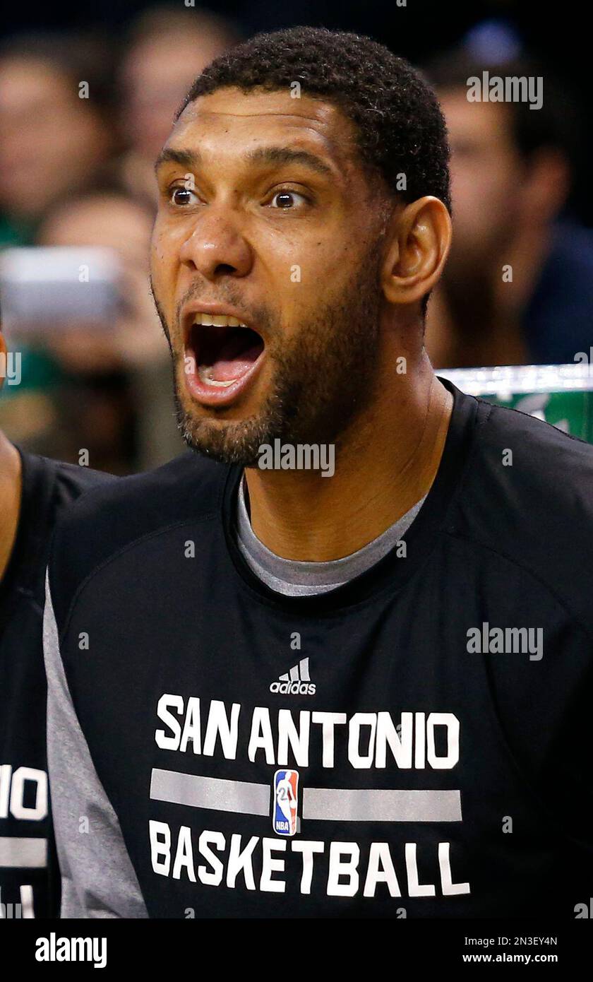 San Antonio Spurs' Tim Duncan cheers from the bench during the second ...