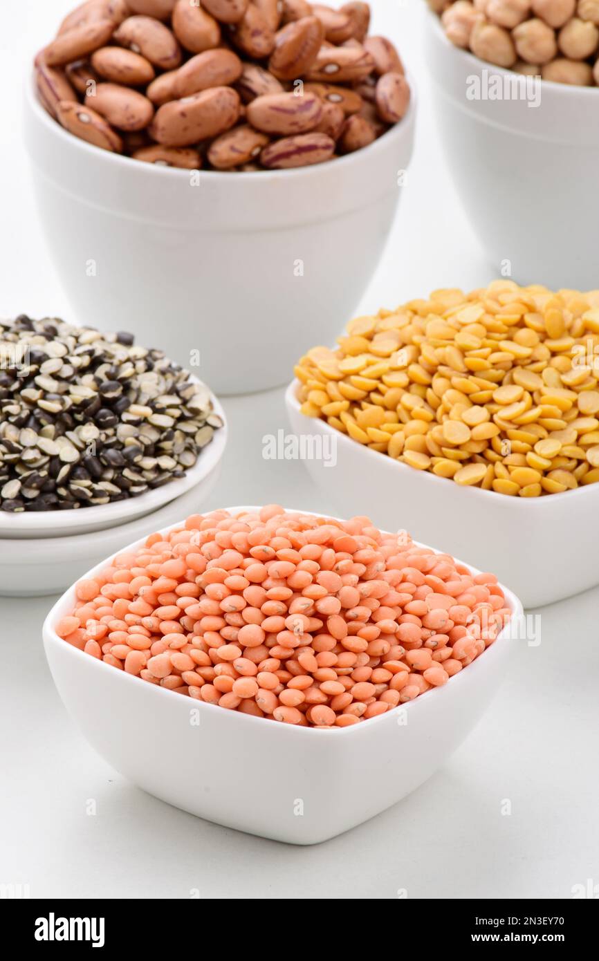 Raw masoor dal in bowl on white background, uncooked red lentils Stock ...