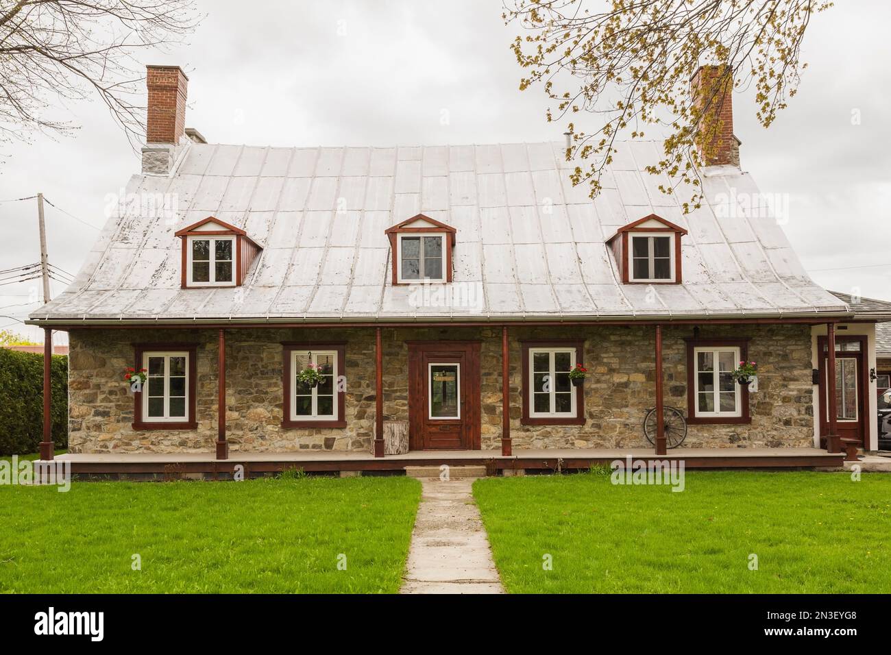 Old circa 1752 burgundy with white trim Canadiana style fieldstone ...