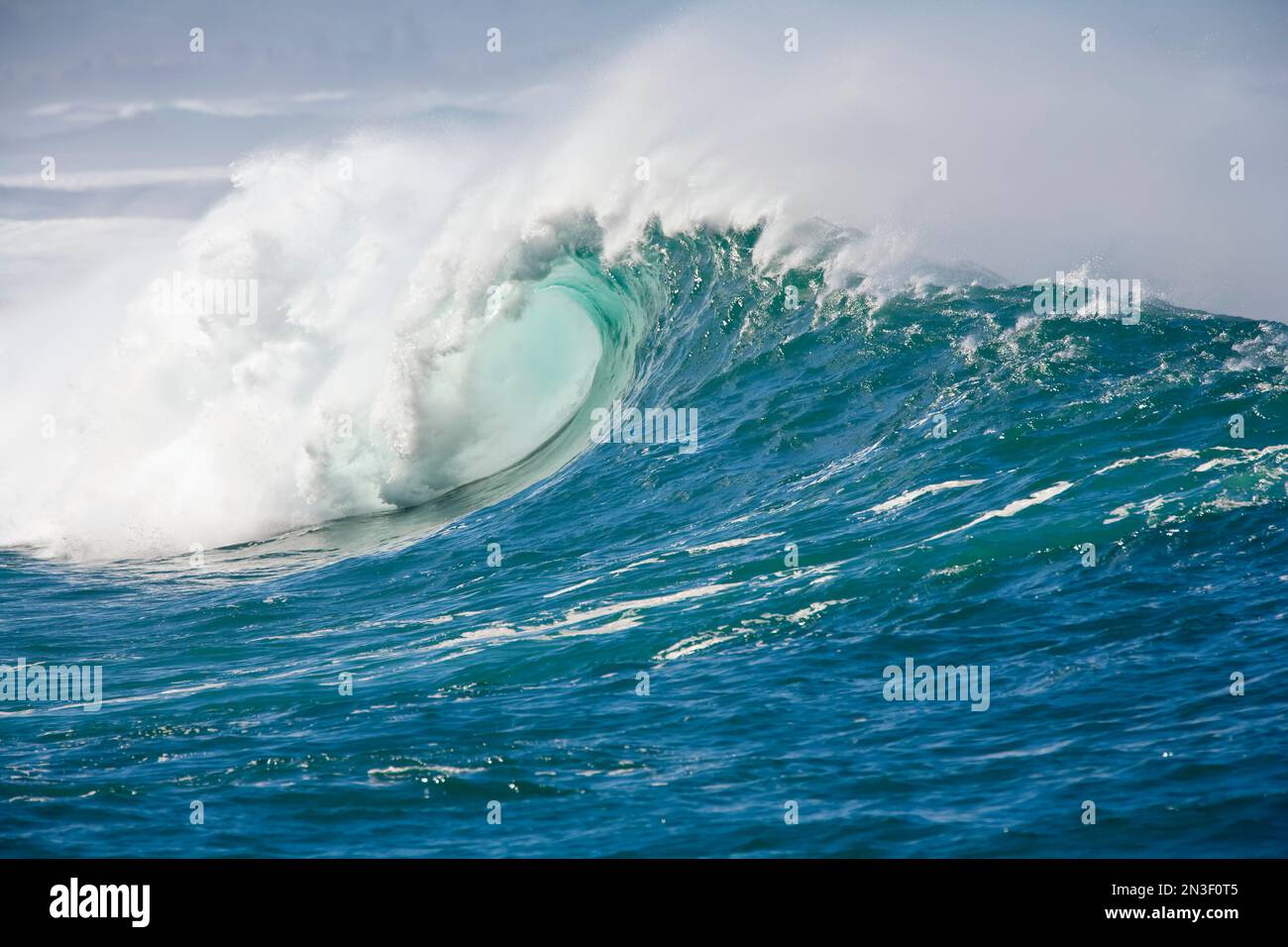 Large winter surf with waves breaking on the north shore of Oahu at ...