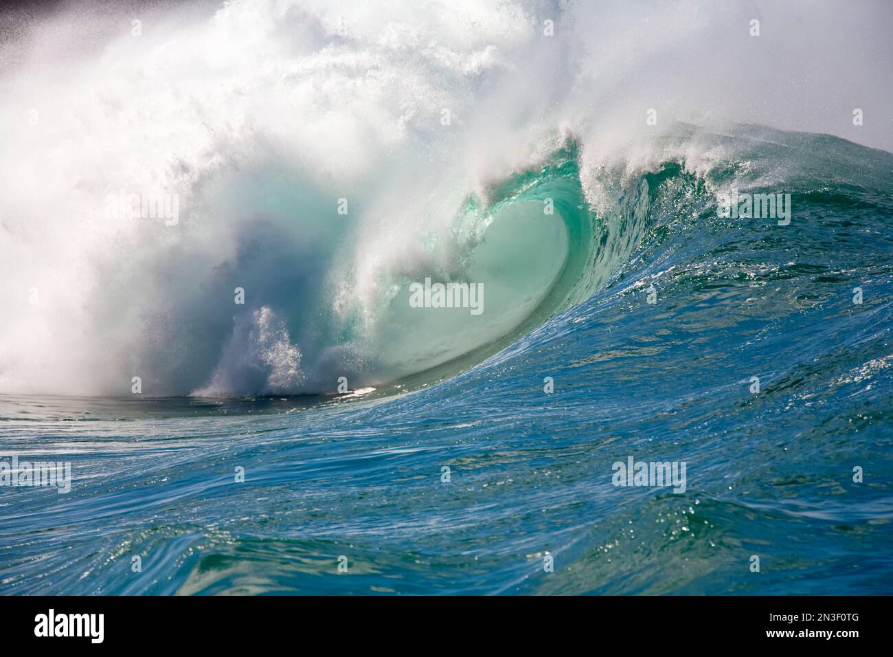 Large winter surf with waves breaking on the north shore of Oahu at ...