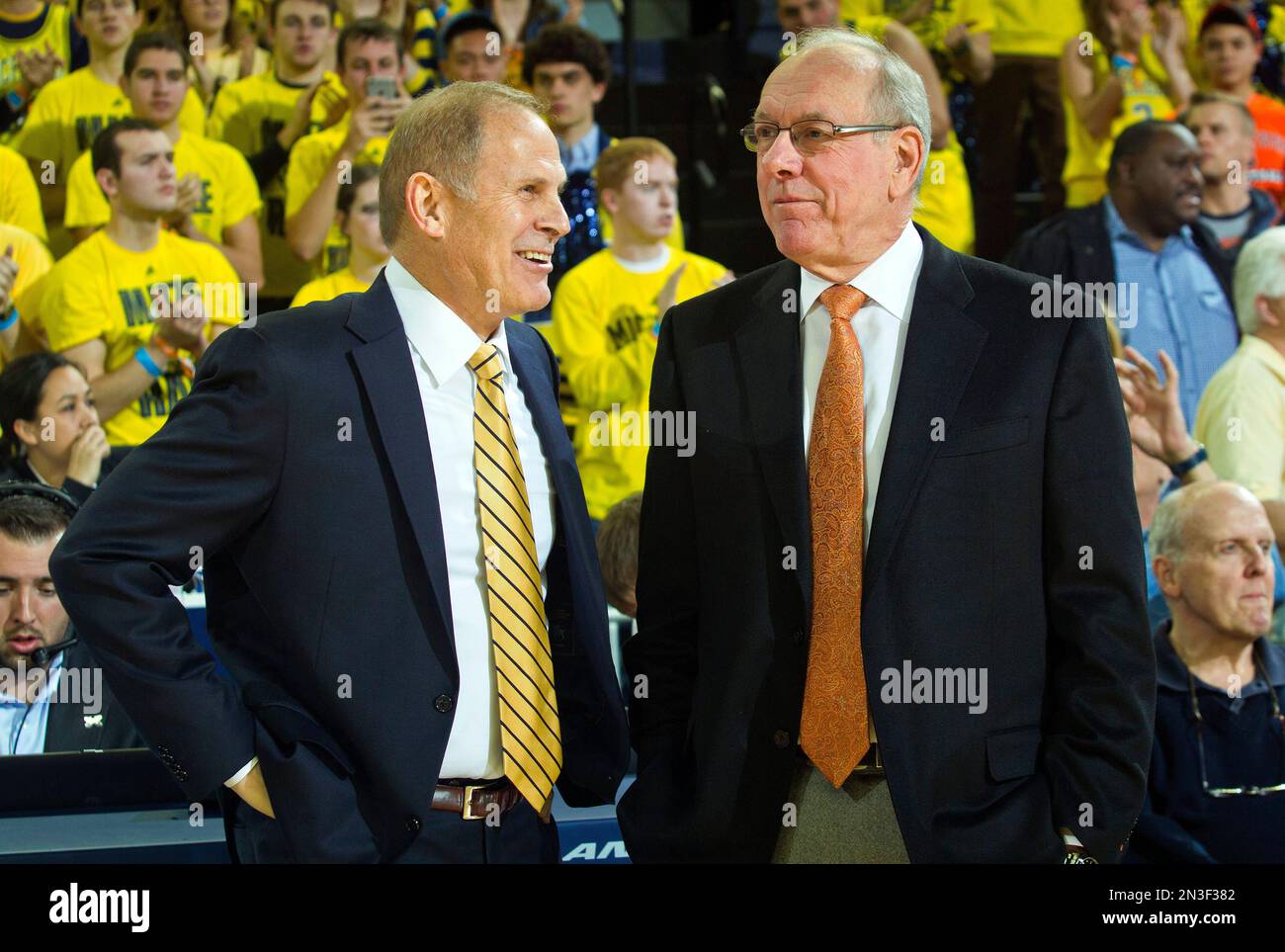 Michigan head coach John Beilein, left, and Syracuse head coach Jim ...