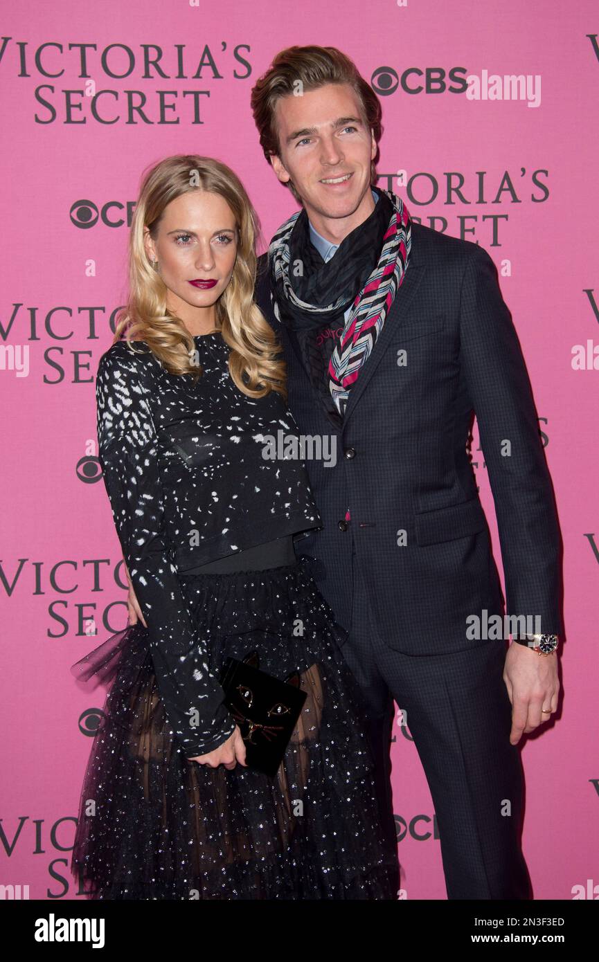 Poppy Delevingne and James Cook pose for photographers upon arrival at ...