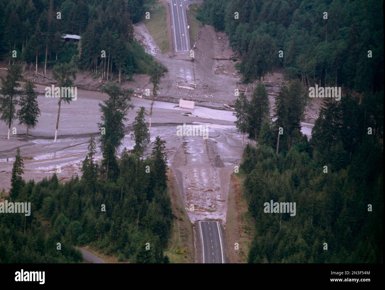A road near the Toutle River is washed out following flooding in the ...