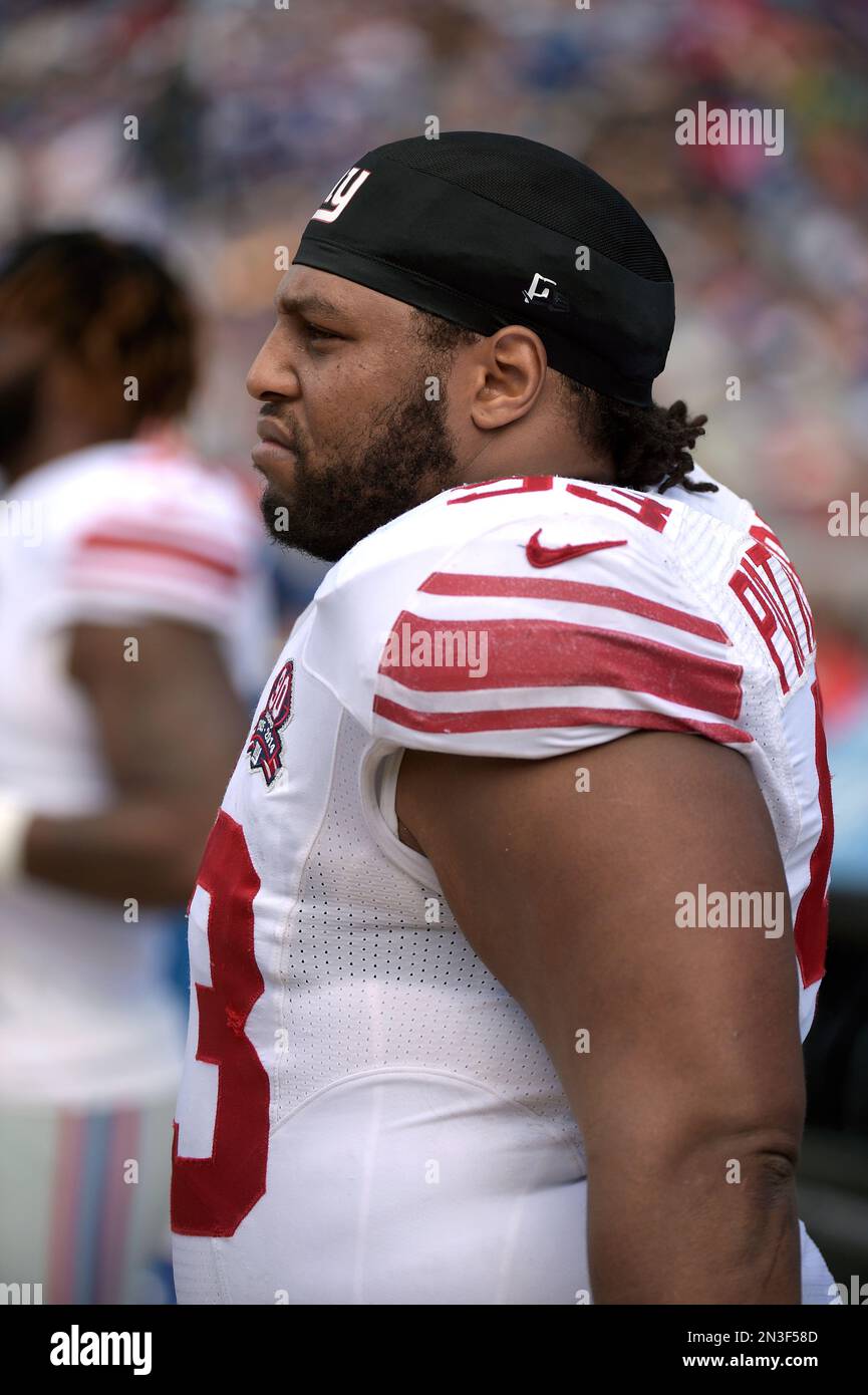 New York Giants defensive tackle Mike Patterson (93) watches from the ...