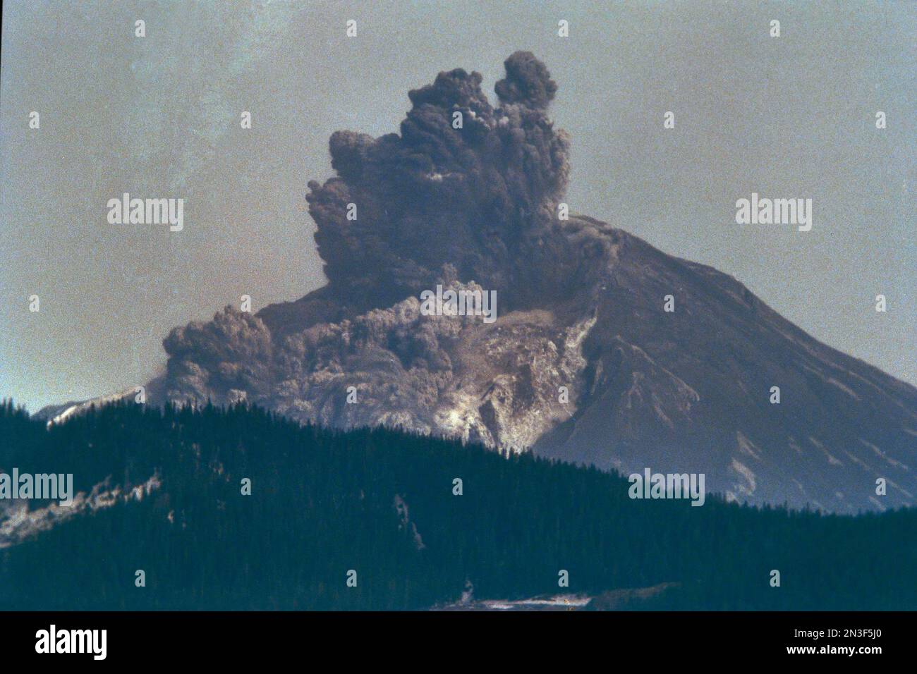 Mount St. Helens in Washington state is shown in various stages of ...