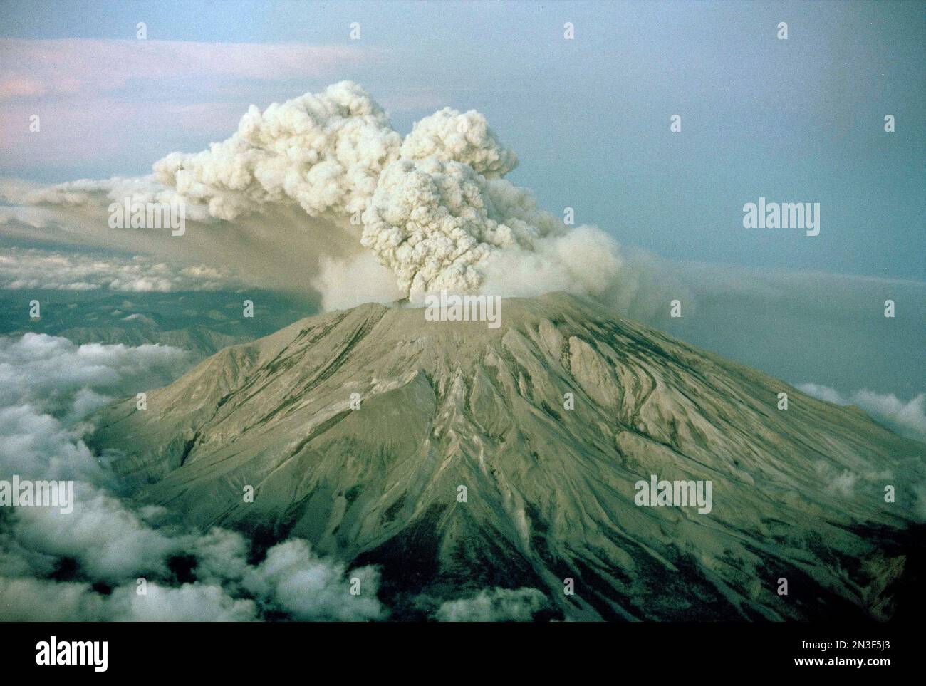 Mount St. Helens in Washington state is shown in various stages of ...