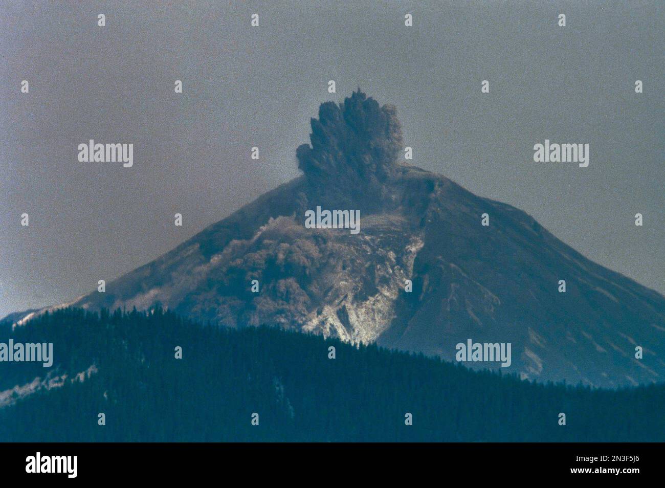 Mount St. Helens in Washington state is shown in various stages of ...