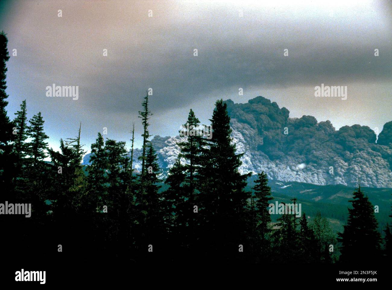 Mount St. Helens in Washington state is shown in various stages of ...