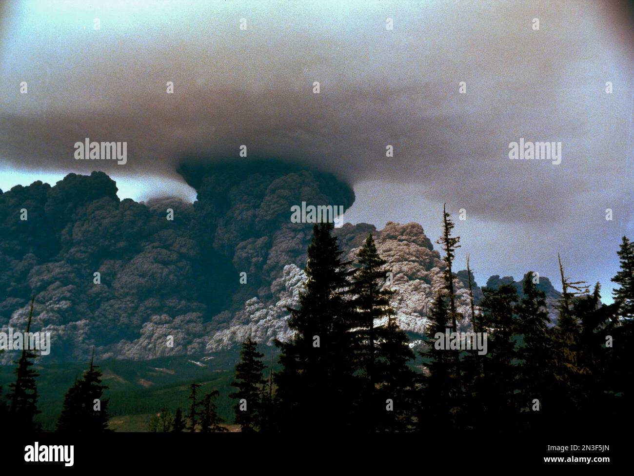 Mount St. Helens in Washington state is shown in various stages of ...