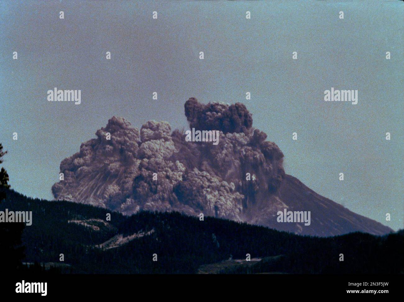 Mount St. Helens in Washington state is shown in various stages of ...