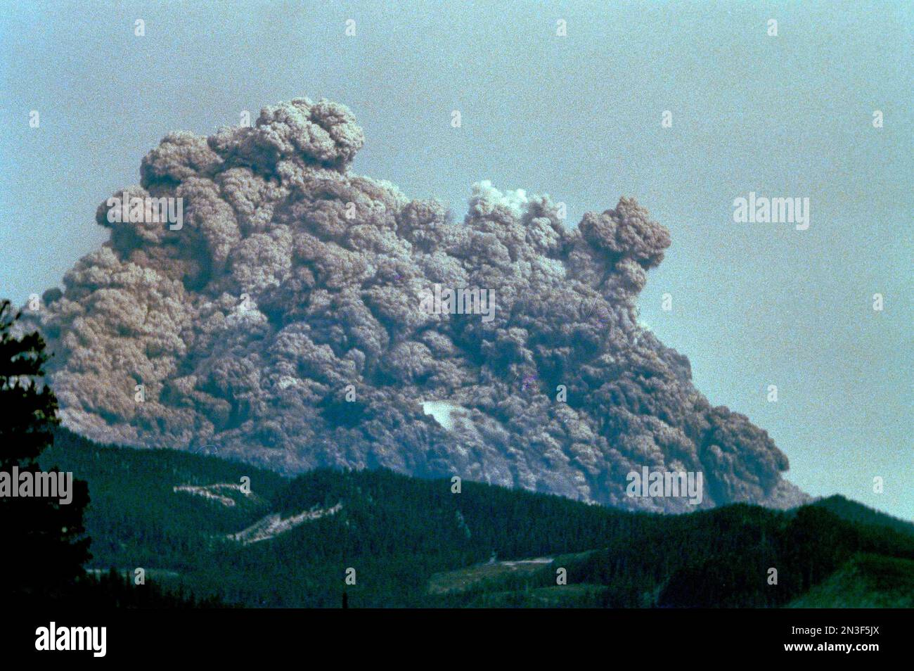 Mount St. Helens in Washington state is shown in various stages of ...