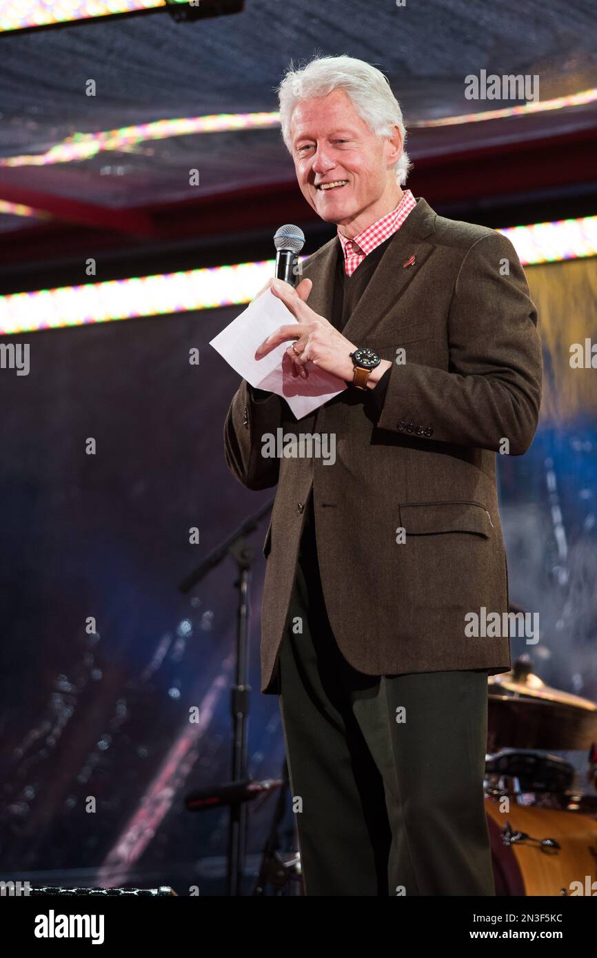 Bill Clinton speaks during the World AIDS Day (RED) concert In Times ...