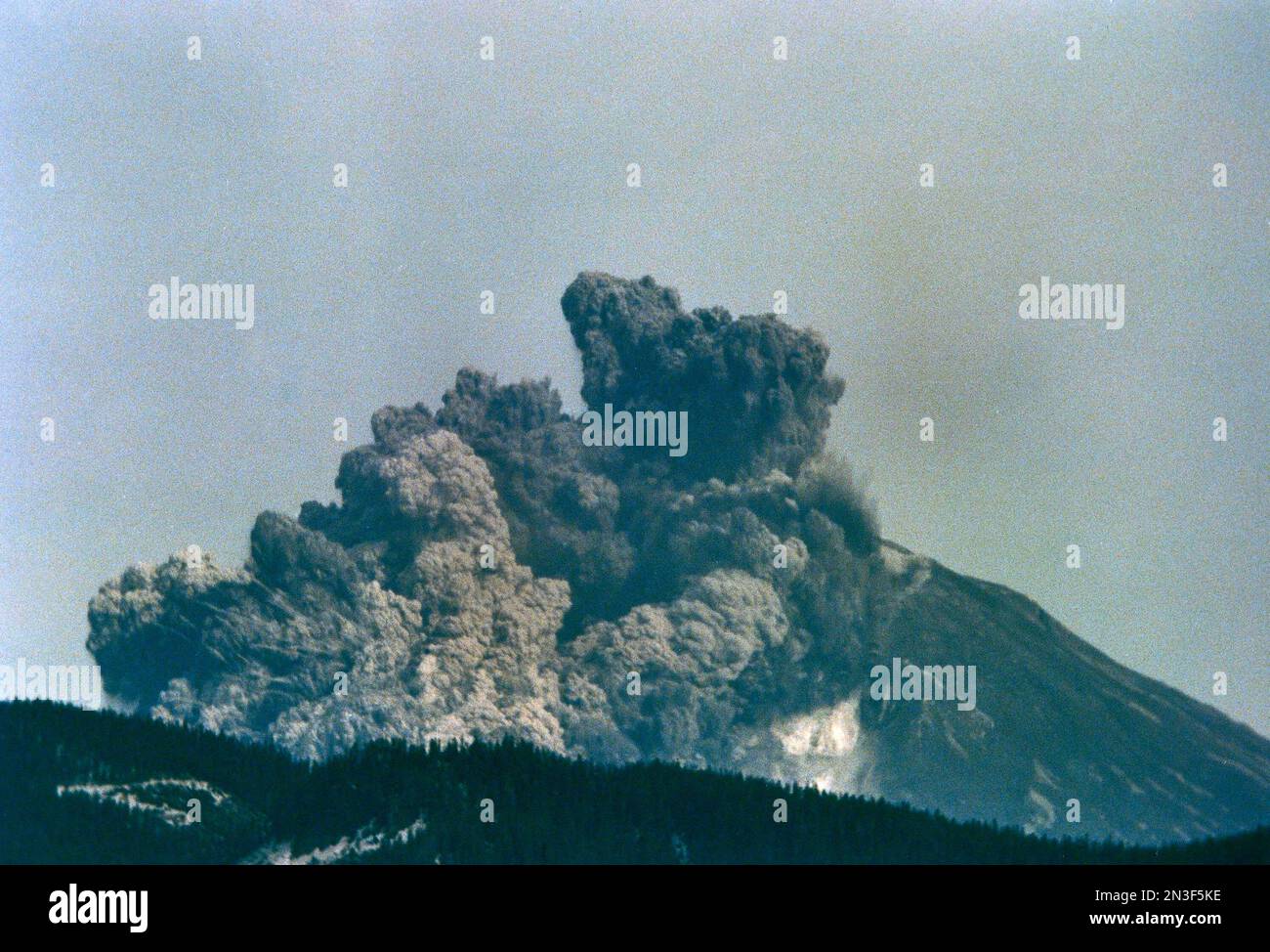 Mount St. Helens in Washington state is shown in various stages of ...