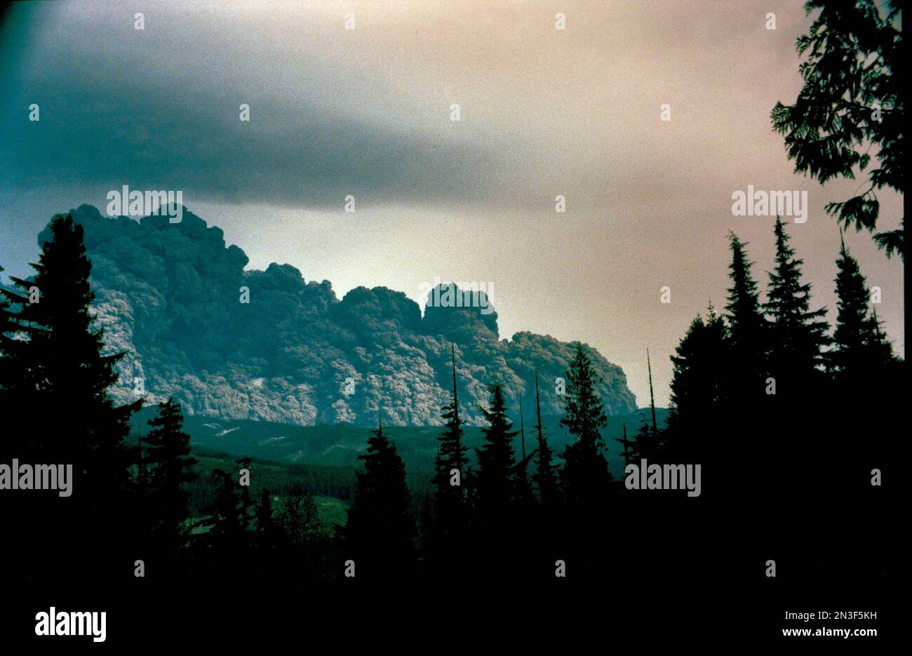 Mount St. Helens in Washington state is shown in various stages of ...