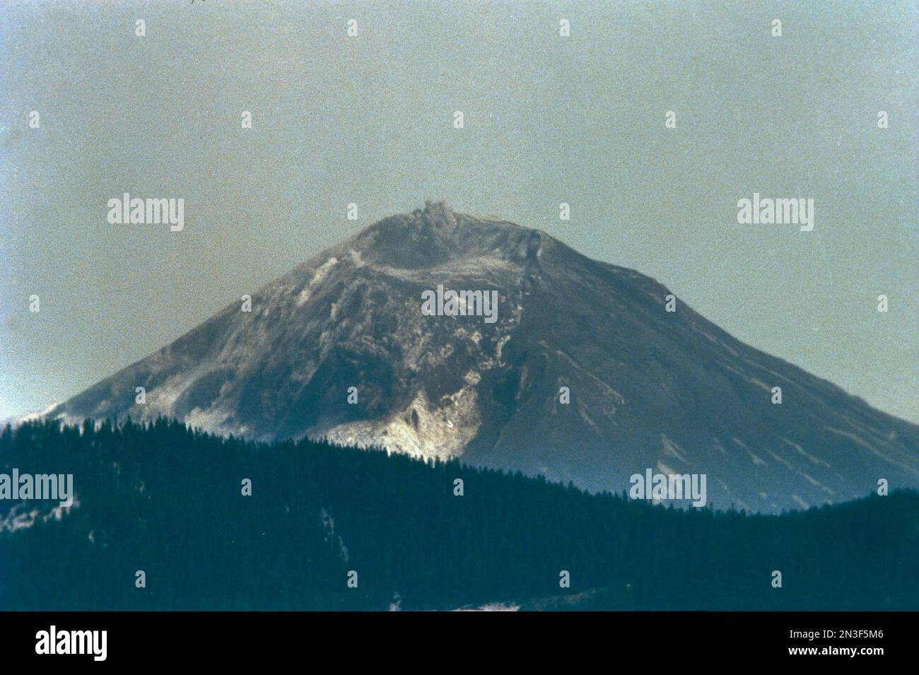 Mount St. Helens in Washington state is shown in various stages of ...