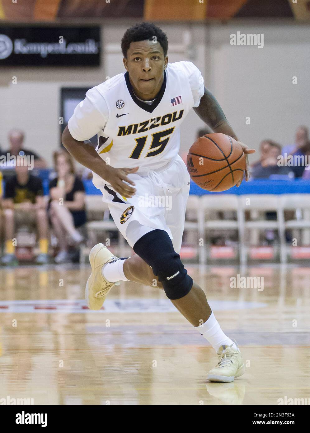 Missouri guard Wes Clark (15) dribbles the basketball up court in the ...