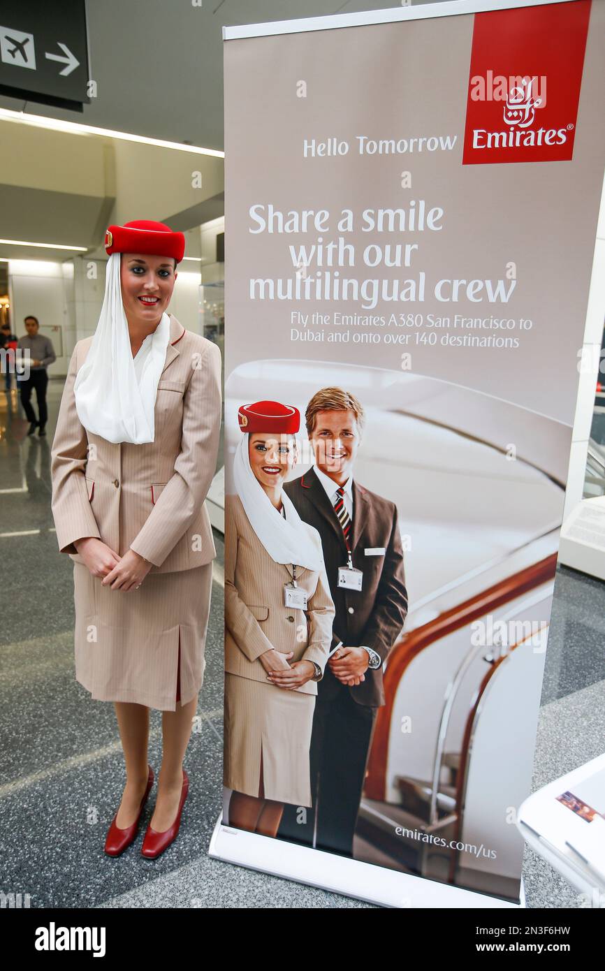 Emirates crew member poses for a photo at San Francisco International ...