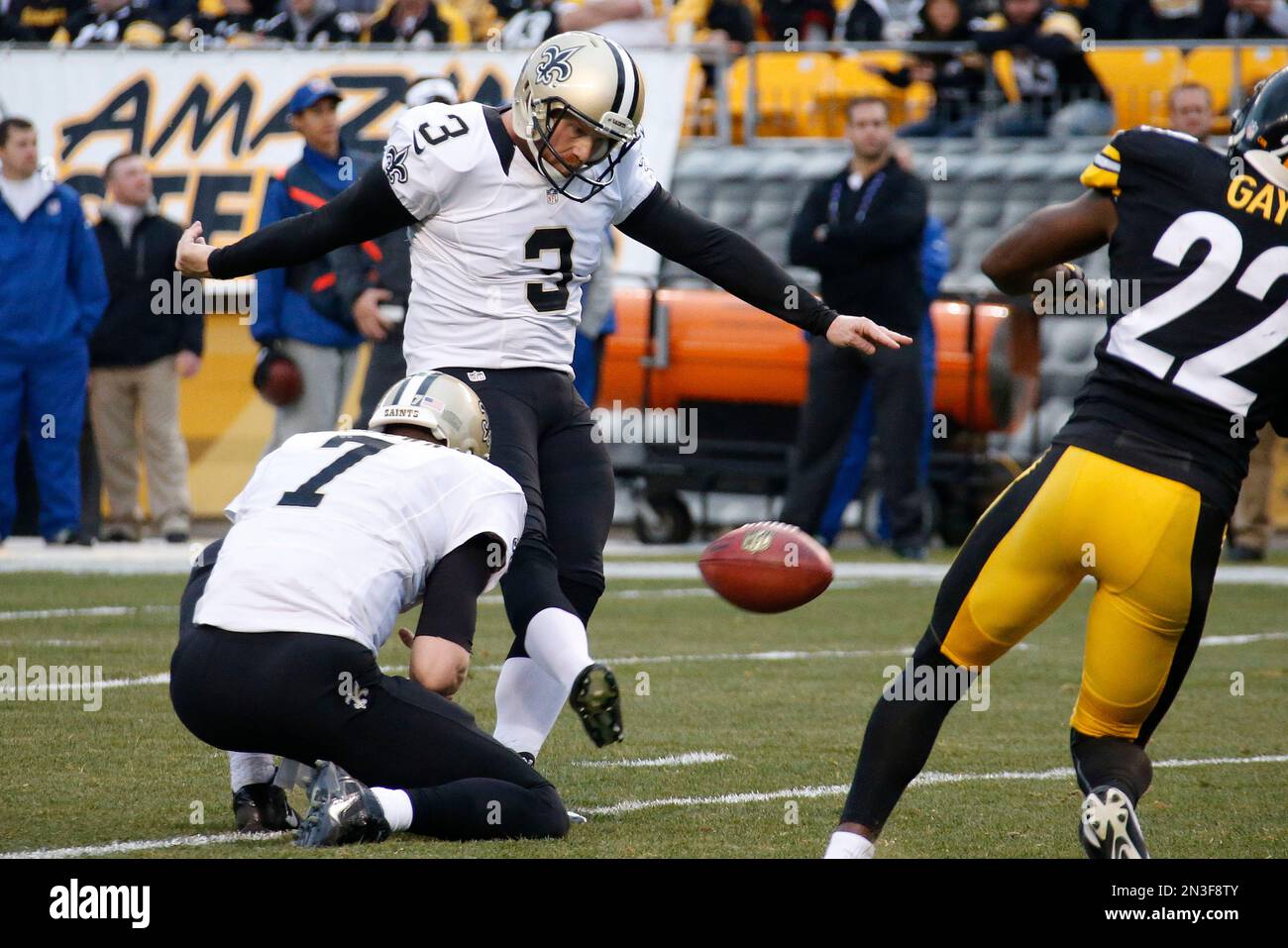 New Orleans Saints kicker Shayne Graham (3) kicks an extra point during ...