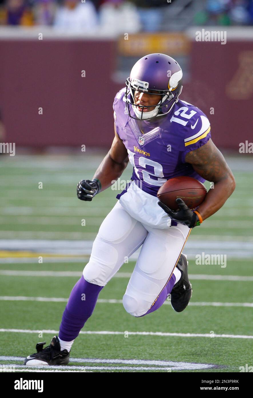 Minnesota Vikings wide receiver Charles Johnson runs up field after ...