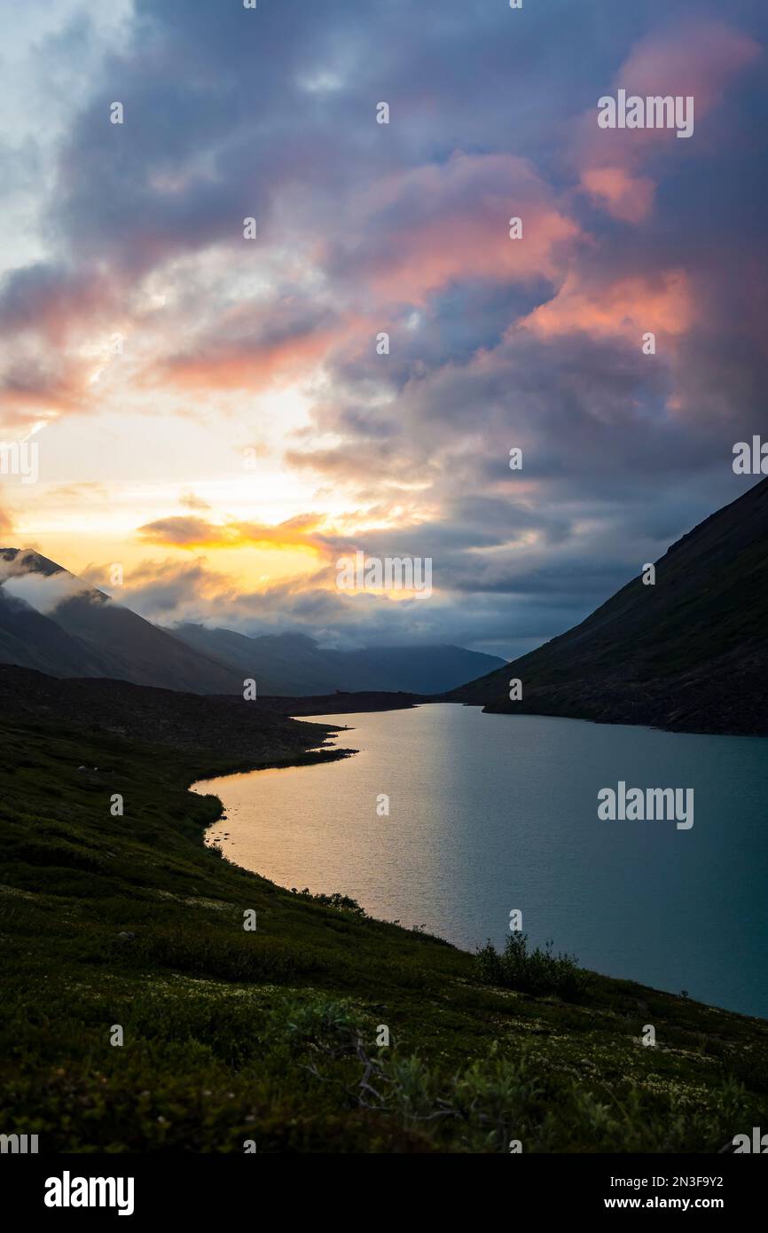 Dramatic sunset light glowing in clouds over Chugach State Park in ...