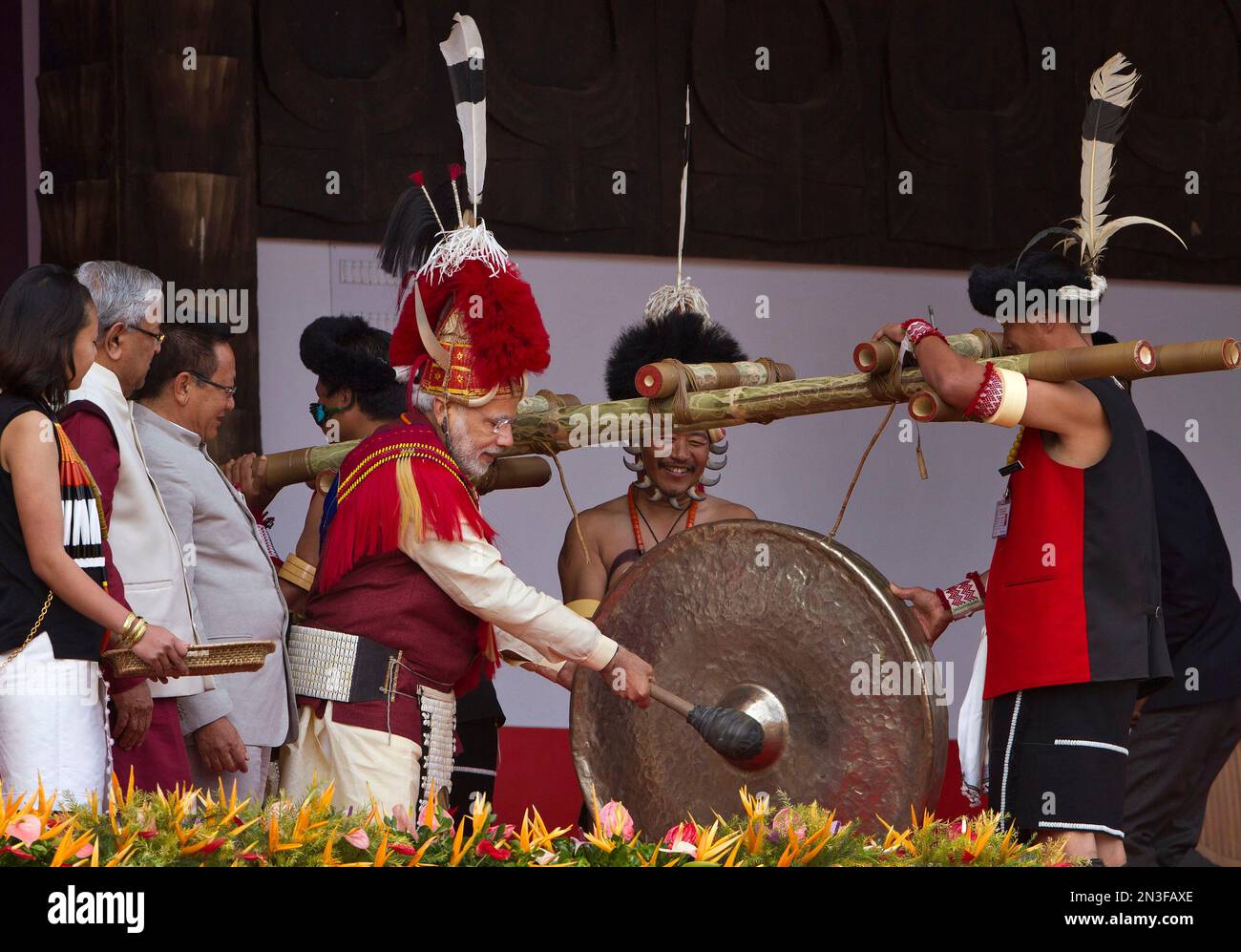 Indian Prime Minister Narendra Modi, third right, dressed in Naga ...